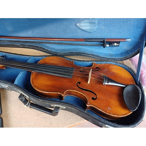 Three cased musical instruments, one flute, one early 20th century ¾ ...