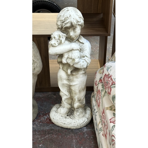 Two cast stone garden statues, one couple - approx. 65cm high and one ...