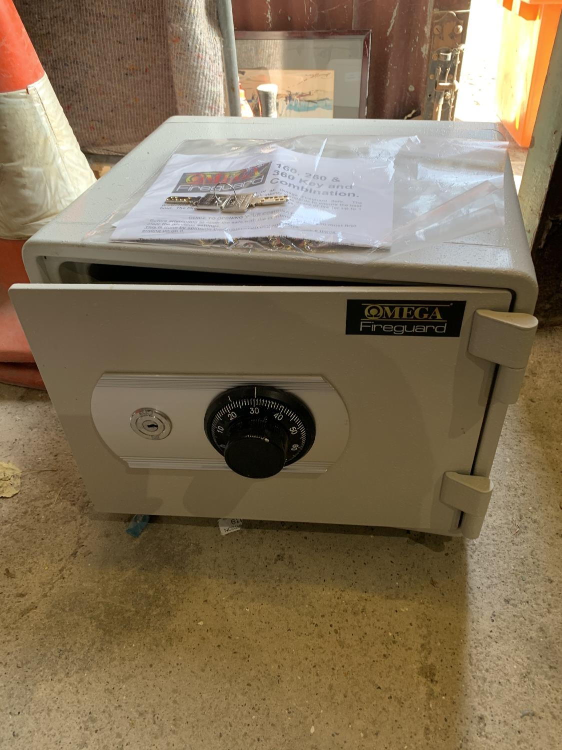 Omega fireguard safe with key and code
