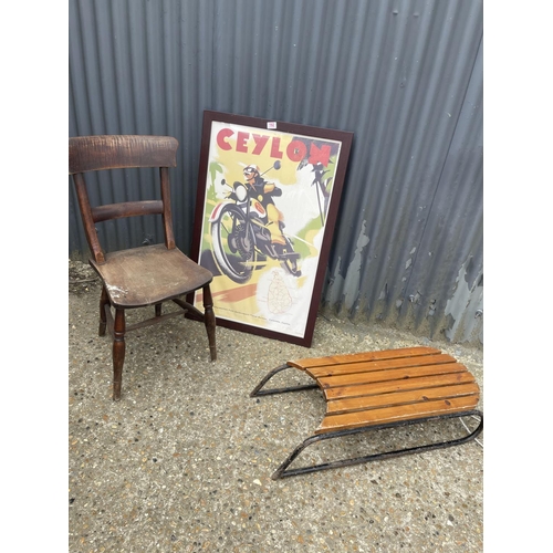 Motorcycle print, chair and vintage sledge
