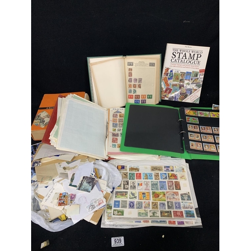 Three stamp albums, catalogues and loose stamps