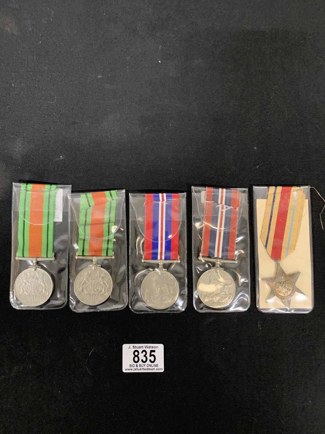 Four WW2 Medals and George V1 Africa Star Medal