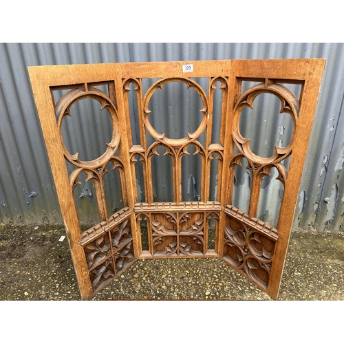 A carved oak church panel