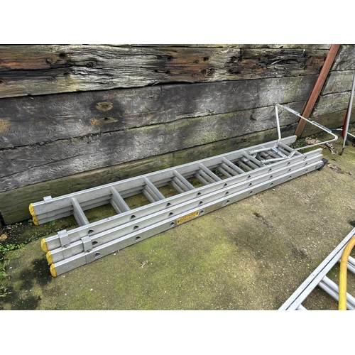 A aluminum three section extending ladder with ladder stay