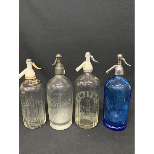 4 vintage soda syphons (blue one cracked)