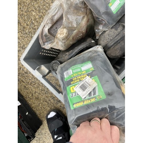 A crate of vintage spark plugs together with box of vintage lights and ...