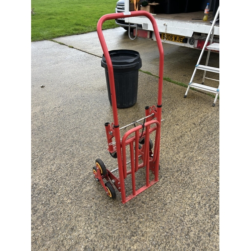 A red stair climbing sack barrow