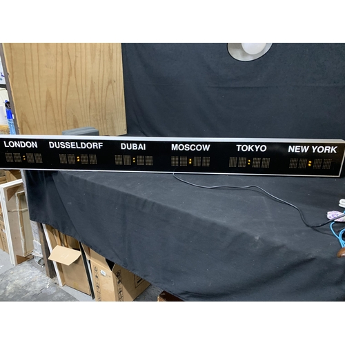 Wharton World digital clock, powers up. Length 180cms