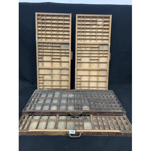 Four vintage print trays