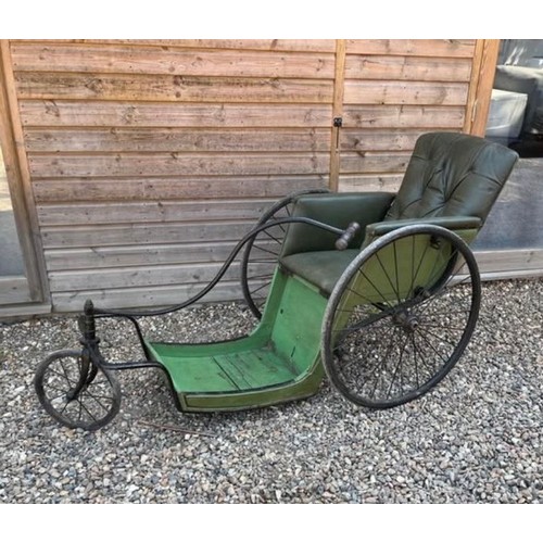 An unusual Victorian bath chair with buttoned leather seat