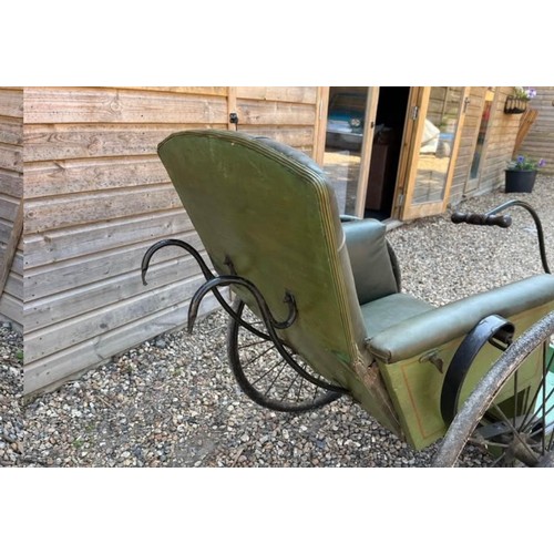 An unusual Victorian bath chair with buttoned leather seat