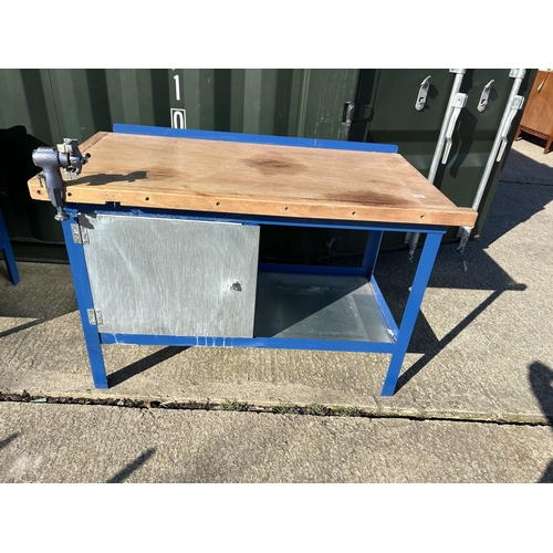 A heavy duty steel framed workbench with small vice 130x 66x 90