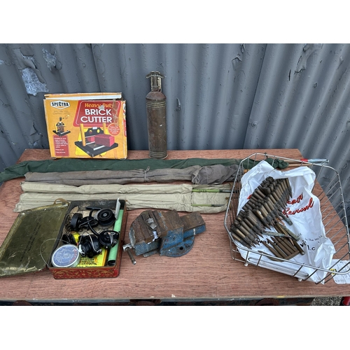 Three fishing rods and reels, vice, Southern Rail extinguisher and ...