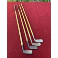 Four Hickory Putters