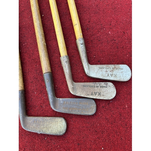 Four Hickory Putters