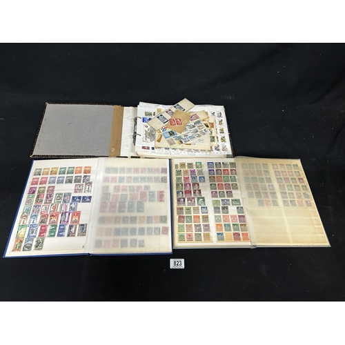 Three foreign stamp albums and stock books