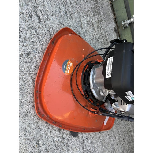 A FLYMO XL500 petrol hover mower, hardly used with instruction manual