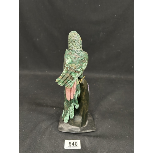 Specimen Amethyst , mounted with multicoloured bone parrot, height 26cms