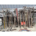 A large collection of assorted vintage and bygone garden hand tools