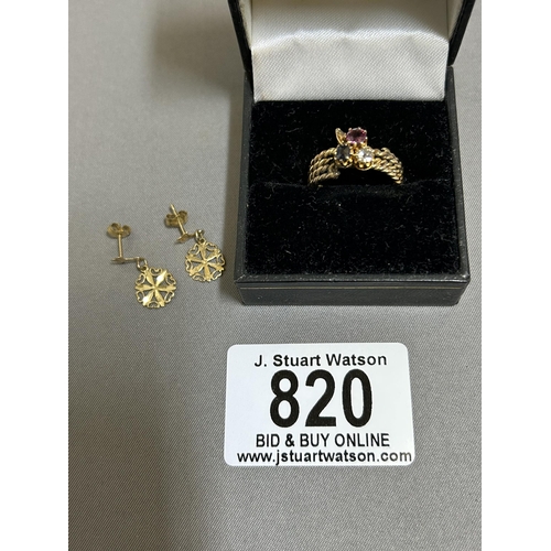 Gold: A Three Stone Rope Effect Dress Ring unmarked, tests 9ct, stones ...