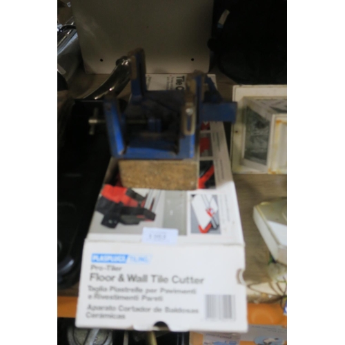 FLOOR AND WALL TILE CUTTER AND JOINTING CLAMP