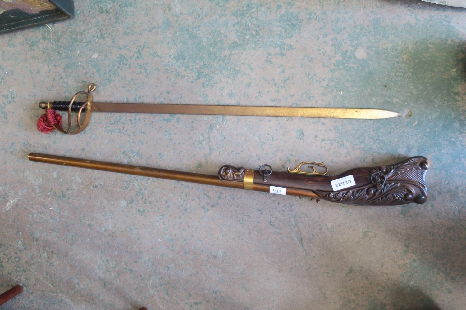 DECORATIVE MUSKET GUN AND A SWORD