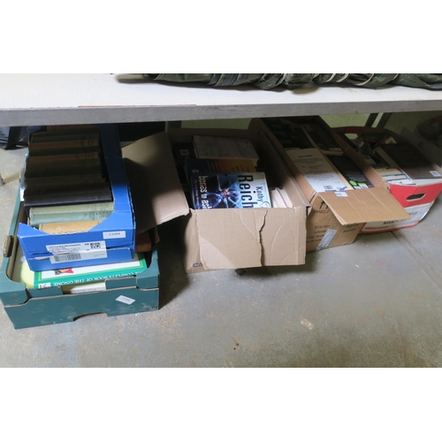 5 BOXES OF BOOKS UNDER THE TABLE