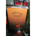 ADDICTION , GOLD MAN, NEW IN BOX