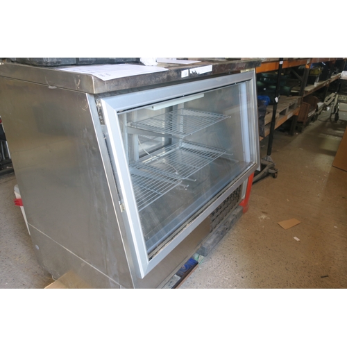100 RESERVE ON THIS WORKING COMMERCIAL FRIDGE . IT HAS A LIFT UP FRONT ...