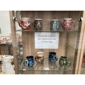 8 studio pottery mugs signed to bottom by Chris Geall