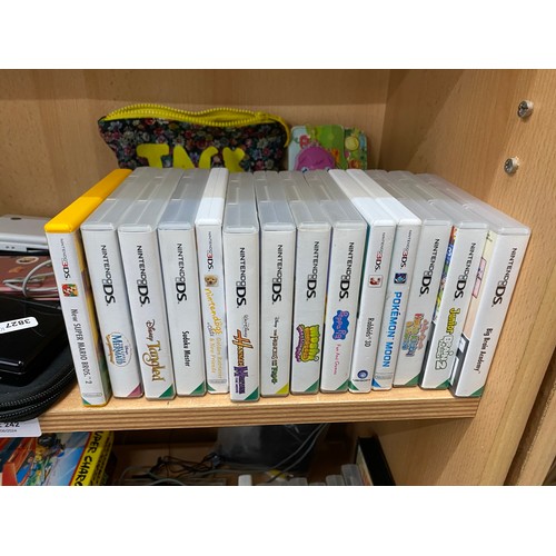 2 shelves of 7 Nintendo DS consoles, games, Sony walkman, 9 Atari games ...