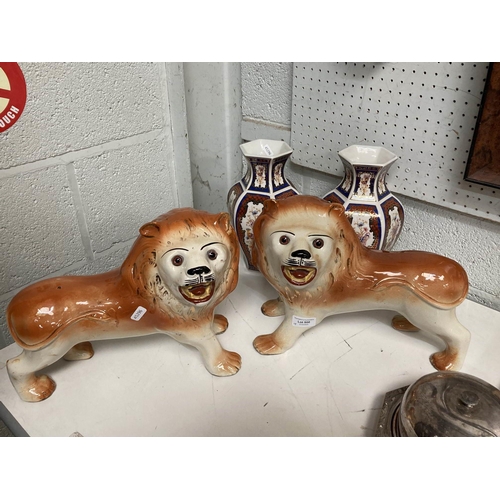 Pair of Victorian lions & a pair of Imari style vases