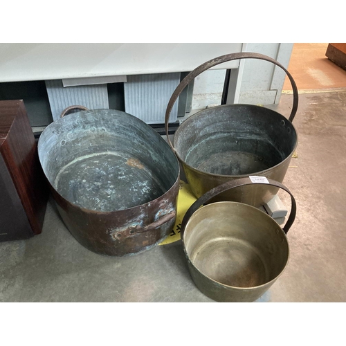 2 brass jam pans 36cm & 25cm & a copper two handled pan 34x49cm