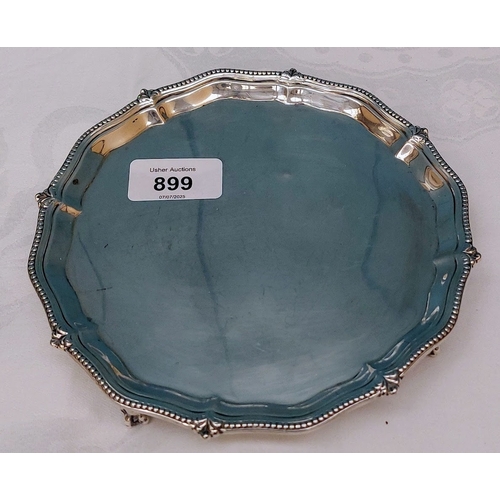 A Late Victorian Silver Circular Waiter on Four Claw and Ball Feet ...