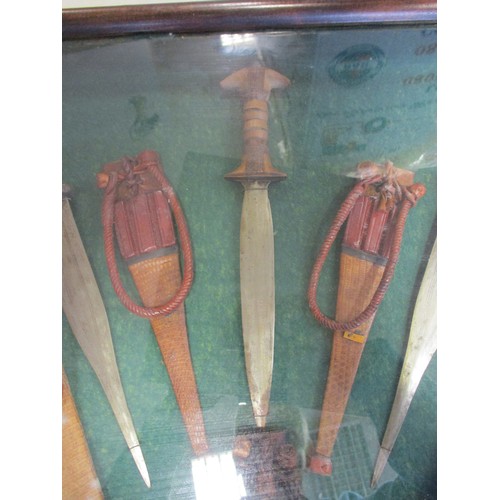 Collection of 11 West African straight bladed knives and daggers with ...