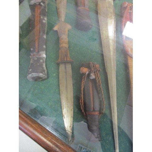 Collection of 11 West African straight bladed knives and daggers with ...