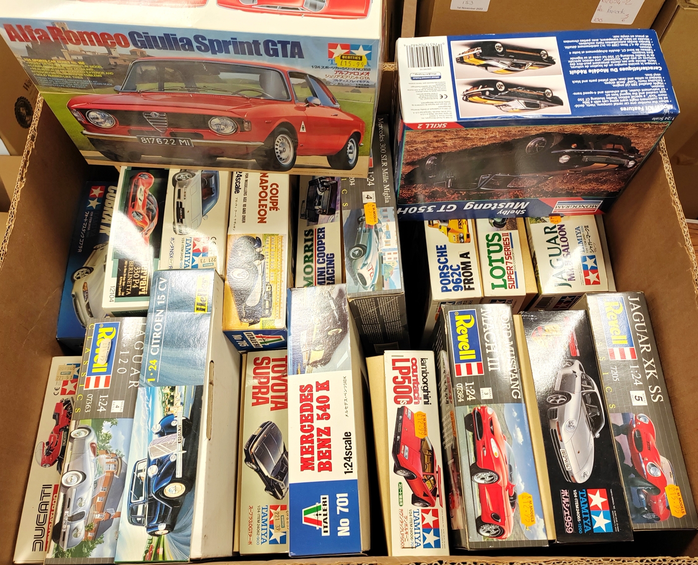 Model kits. Collection of cars, motorbikes and planes, appear complete ...