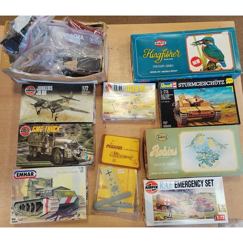 Collection of mostly unassembled kits model kits, appear complete with ...