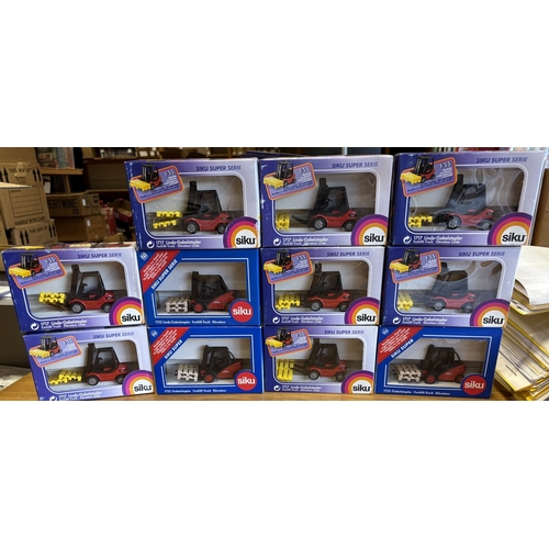 Collection of mostly boxed model forklifts, generally excellent in ...