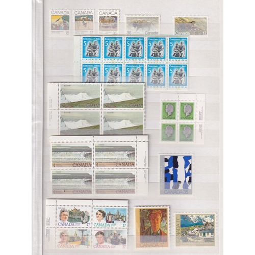STAMPS CANADA Mint and used in red stock book including New Foundland ...