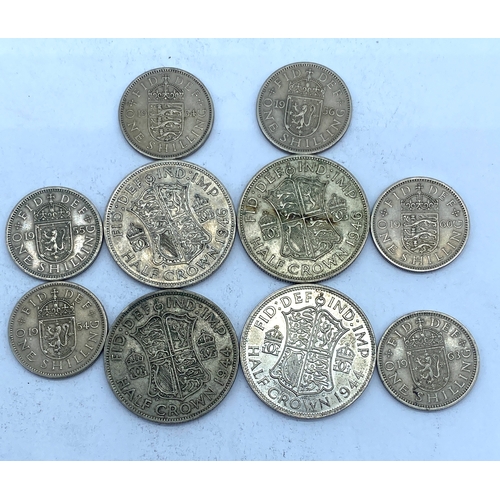 A mixed lot of coins, half crowns & 1 shilling coins, half crowns are ...