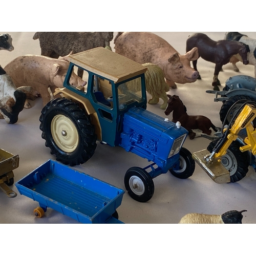 A collection of corgi farm animals and toys