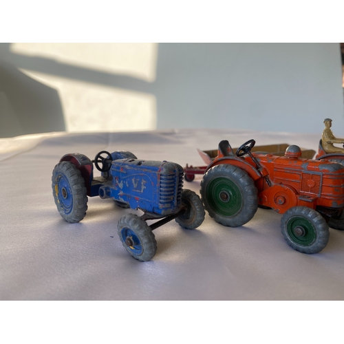 A collection of Dinky toy field marshal tractors