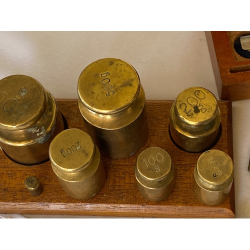 A collection of postal stamp weights
