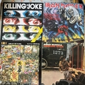 A collection of four vintage vinyl long-playing (LP) records, each ...