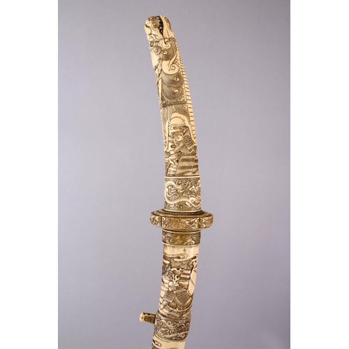 A LARGE JAPANESE MEIJI PERIOD CARVED SECTIONAL IVORY KATANA / SWORD ...