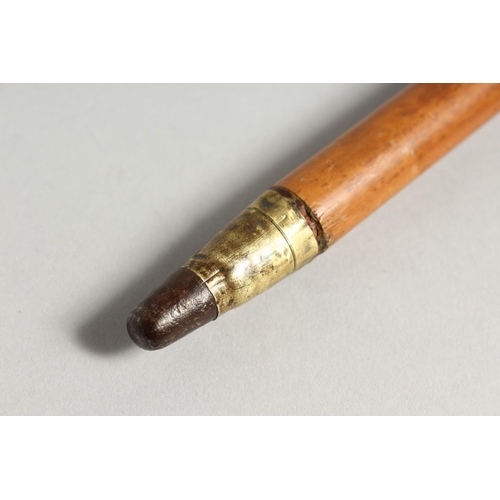 A GOOD AMBER WALKING STICK with 18ct gold band