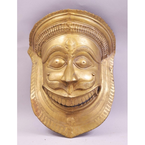 A LARGE 19TH CENTURY INDIAN BRONZE WALL MASK OF NARASIMHA / MAN LION; a ...
