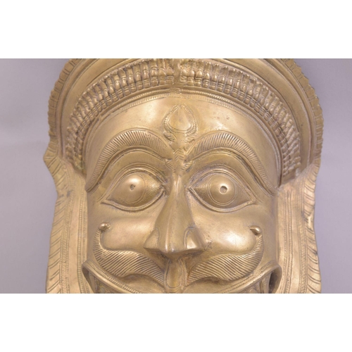 A LARGE 19TH CENTURY INDIAN BRONZE WALL MASK OF NARASIMHA / MAN LION; a ...