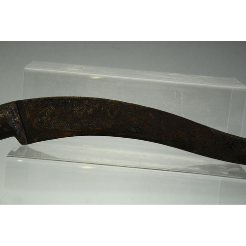 A LARGE INDO PERSIAN DAGGER, with engraved blade and wooden handle ...